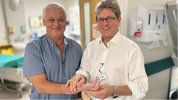 10 years after UK's first hand transplant, patient and surgeon meet ...